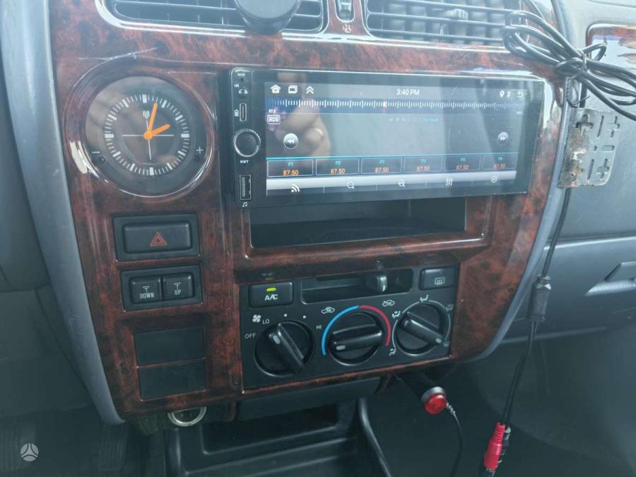 Sarkans Toyota Land Cruiser 2002 Viļņa, ar dzinēja tilpumu 3.00 L un nobraukumu 400 tūkst. km par 7500 €, foto 24 vietnē AUTOMOTO.COM.LV