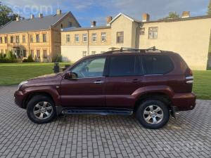 Red Toyota Land Cruiser 2004 in Dobele, with an engine capacity of 4.00 L and mileage of 339 thousand km for 6900 €, photo 3 on AUTOMOTO.COM.LV
