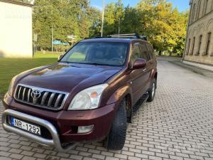 Red Toyota Land Cruiser 2004 in Dobele, with an engine capacity of 4.00 L and mileage of 339 thousand km for 6900 €, photo 4 on AUTOMOTO.COM.LV