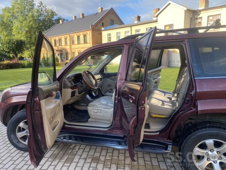 Red Toyota Land Cruiser 2004 in Dobele, with an engine capacity of 4.00 L and mileage of 339 thousand km for 6900 €, photo 10 on AUTOMOTO.COM.LV