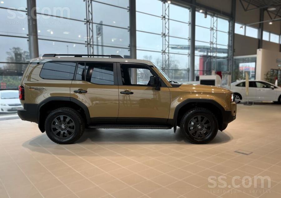 Yellow Toyota Land Cruiser 2024 in Riga, with an engine capacity of 2.80 L and mileage of 317 thousand km for 42000 €, photo 3 on AUTOMOTO.COM.LV