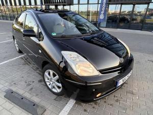Black Toyota Prius 2005 in Vilnius, with an engine capacity of 1.50 L and mileage of 240 thousand km for 2200 €, photo  on AUTOMOTO.COM.LV