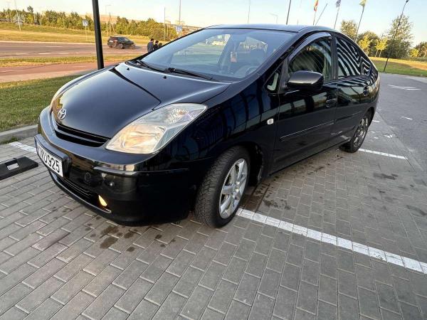 Melns Toyota Prius 2005 Viļņa, ar dzinēja tilpumu 1.50 L un nobraukumu 240 tūkst. km par 2200 €, foto 6 vietnē AUTOMOTO.COM.LV