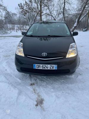 Black Toyota Prius 2006 in Panevezys, with an engine capacity of 1.50 L and mileage of 331 thousand km for 3500 €, photo  on AUTOMOTO.COM.LV