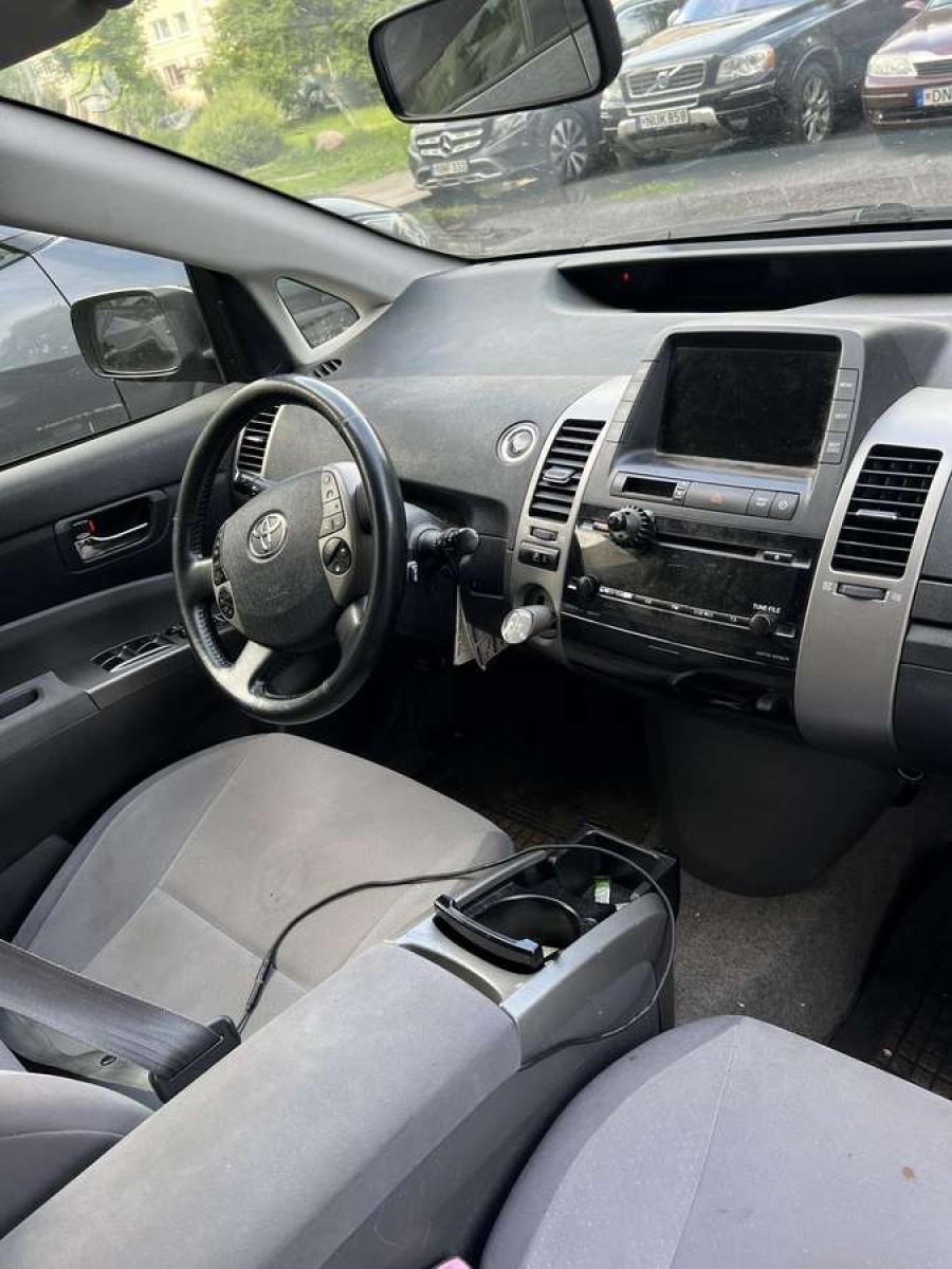 Melns Toyota Prius 2006 Viļņa, ar dzinēja tilpumu 1.50 L un nobraukumu 309 tūkst. km par 1999 €, foto 13 vietnē AUTOMOTO.COM.LV