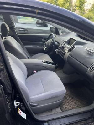 Melns Toyota Prius 2006 Viļņa, ar dzinēja tilpumu 1.50 L un nobraukumu 309 tūkst. km par 1999 €, foto 15 vietnē AUTOMOTO.COM.LV