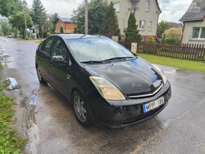 Black Toyota Prius 2006 in Kaunas, with an engine capacity of 1.50 L and mileage of 400 thousand km for 2950 €, photo 4 on AUTOMOTO.COM.LV