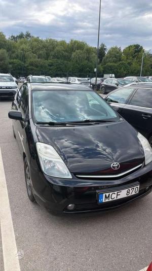Black Toyota Prius 2008 in Kaunas, with an engine capacity of 1.50 L and mileage of 326 thousand km for 4749 €, photo  on AUTOMOTO.COM.LV