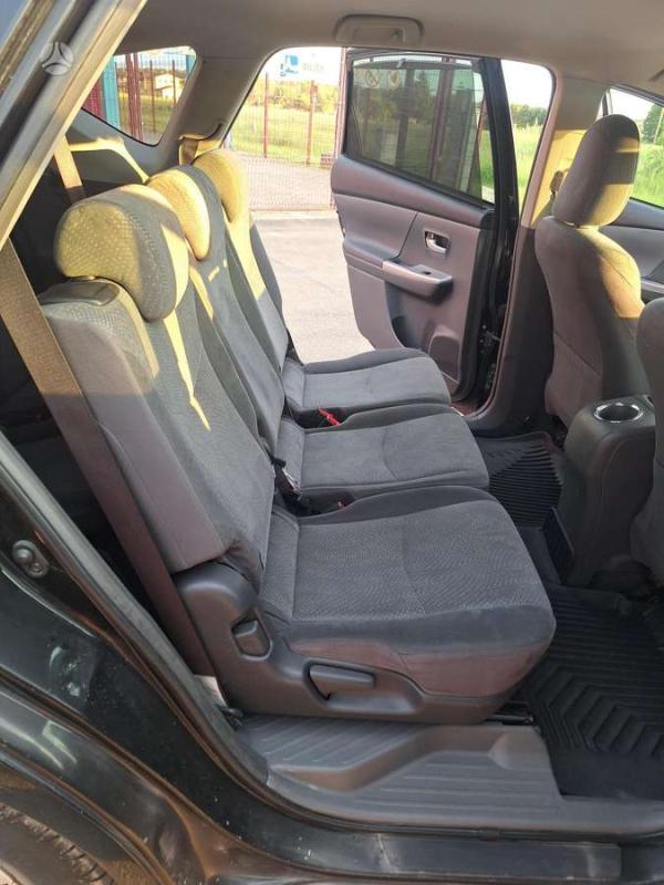 Black Toyota Prius 2013 in Vilnius, with an engine capacity of 1.80 L and mileage of 200 thousand km for 7500 €, photo 8 on AUTOMOTO.COM.LV