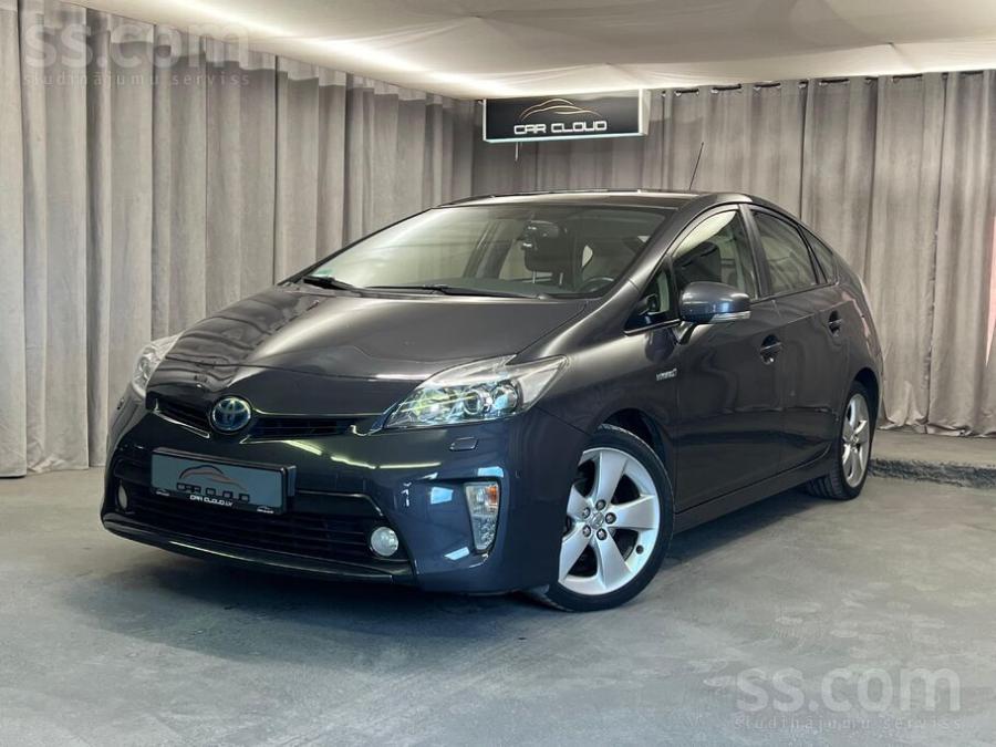 Black Toyota Prius 2014 in Riga, with an engine capacity of 1.80 L and mileage of 267 thousand km for 8490 €, photo 1 on AUTOMOTO.COM.LV