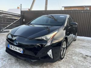 Black Toyota Prius 2017 in Kaunas, with an engine capacity of 1.80 L and mileage of 264 thousand km for 6900 €, photo 2 on AUTOMOTO.COM.LV