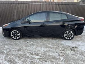 Black Toyota Prius 2017 in Kaunas, with an engine capacity of 1.80 L and mileage of 264 thousand km for 6900 €, photo 5 on AUTOMOTO.COM.LV