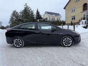 Black Toyota Prius 2019 in Vilnius, with an engine capacity of 1.80 L and mileage of 110 thousand km for 11450 €, photo 17 on AUTOMOTO.COM.LV
