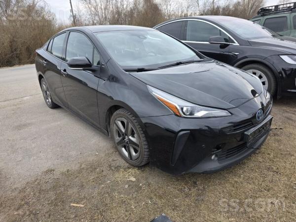 Black Toyota Prius 2022 in Jelgava, with an engine capacity of 1.80 L and mileage of 248 thousand km for 12900 €, photo 1 on AUTOMOTO.COM.LV