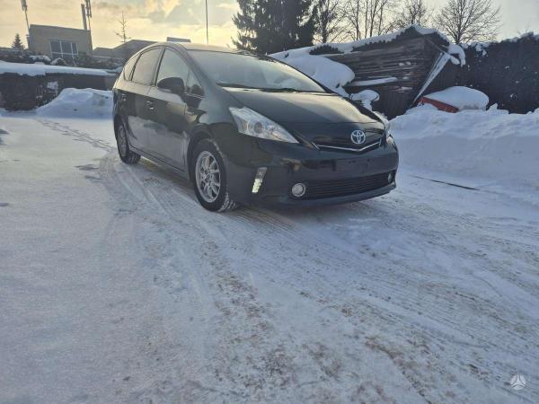 Melns Toyota Prius 2013 Viļņa, ar dzinēja tilpumu 1.80 L un nobraukumu 277 tūkst. km par 9900 €, foto 1 vietnē AUTOMOTO.COM.LV