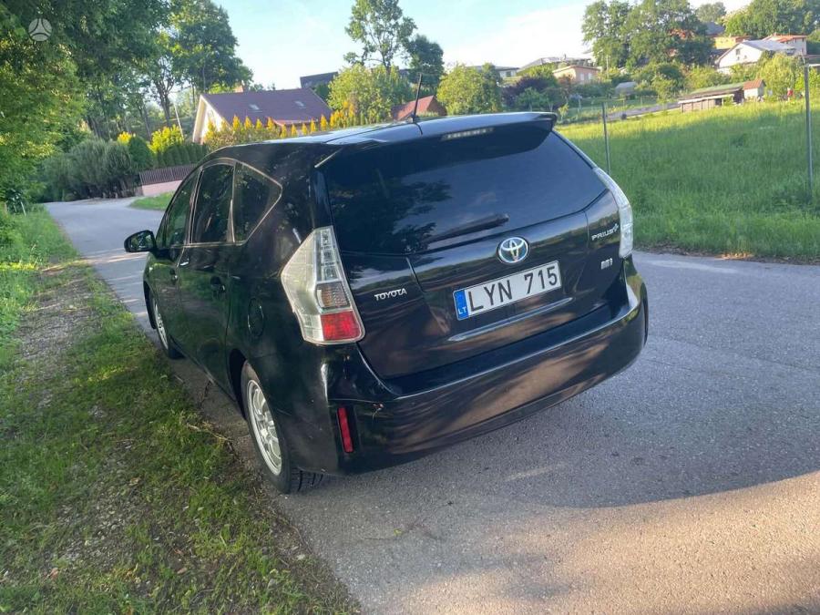 Black Toyota Prius 2014 in Kaunas, with an engine capacity of 1.80 L and mileage of 336 thousand km for 7800 €, photo 5 on AUTOMOTO.COM.LV