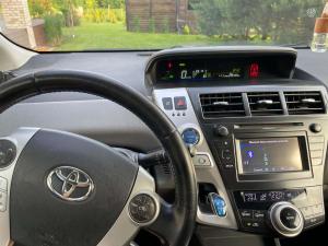 Black Toyota Prius 2014 in Kaunas, with an engine capacity of 1.80 L and mileage of 336 thousand km for 7800 €, photo 8 on AUTOMOTO.COM.LV
