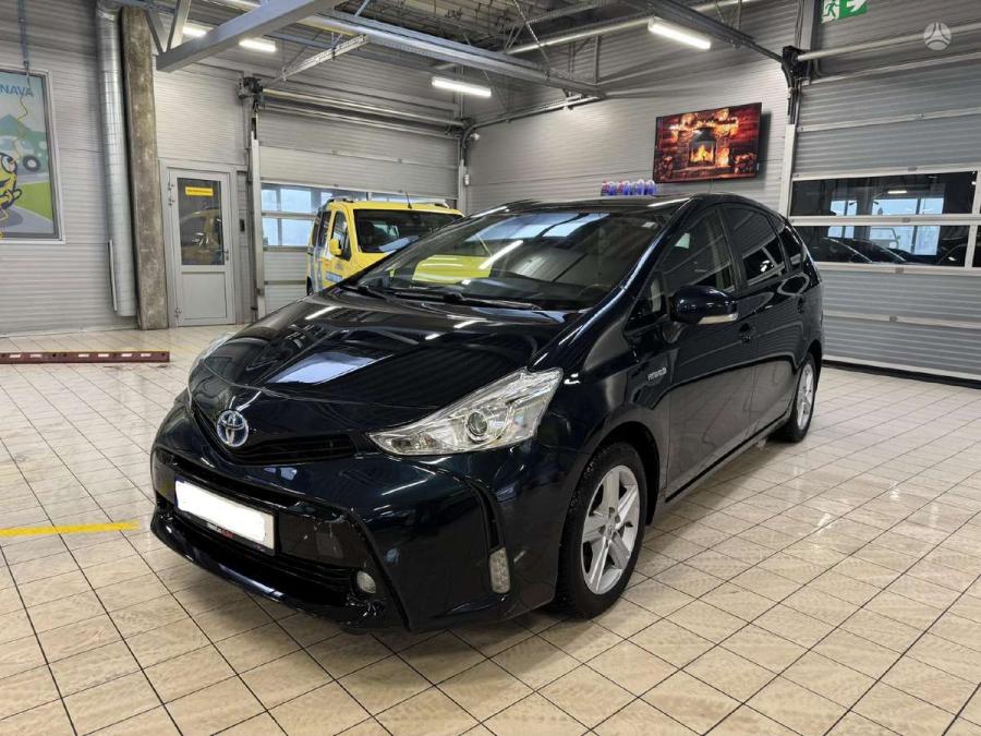 Black Toyota Prius 2017 in Vilnius, with an engine capacity of 1.80 L and mileage of 320 thousand km for 11200 €, photo 9 on AUTOMOTO.COM.LV