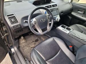 Black Toyota Prius 2017 in Telschi, with an engine capacity of 1.80 L and mileage of 285 thousand km for 12500 €, photo 11 on AUTOMOTO.COM.LV