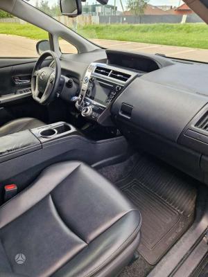 Black Toyota Prius 2017 in Telschi, with an engine capacity of 1.80 L and mileage of 285 thousand km for 12500 €, photo 14 on AUTOMOTO.COM.LV