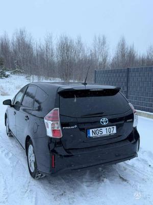 Black Toyota Prius 2018 in Vilnius, with an engine capacity of 1.80 L and mileage of 219 thousand km for 12600 €, photo 5 on AUTOMOTO.COM.LV