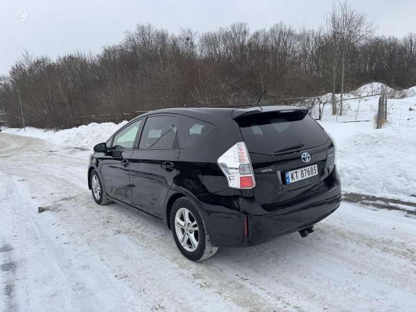 Black Toyota Prius 2014 in Kaunas, with an engine capacity of 1.80 L and mileage of 352 thousand km for 6100 €, photo 3 on AUTOMOTO.COM.LV