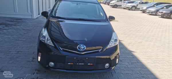 Black Toyota Prius 2012 in Vilnius, with an engine capacity of 1.80 L and mileage of 230 thousand km for 10950 €, photo 2 on AUTOMOTO.COM.LV