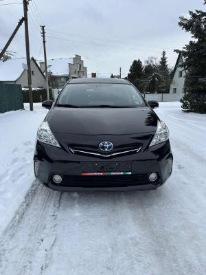 Black Toyota Prius 2013 in Kaunas, with an engine capacity of 1.80 L and mileage of 283 thousand km for 9500 €, photo  on AUTOMOTO.COM.LV