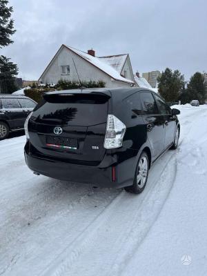 Black Toyota Prius 2013 in Kaunas, with an engine capacity of 1.80 L and mileage of 283 thousand km for 9500 €, photo 5 on AUTOMOTO.COM.LV