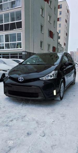 Melns Toyota Prius 2016 Viļņa, ar dzinēja tilpumu 1.80 L un nobraukumu 288 tūkst. km par 11400 €, foto  vietnē AUTOMOTO.COM.LV