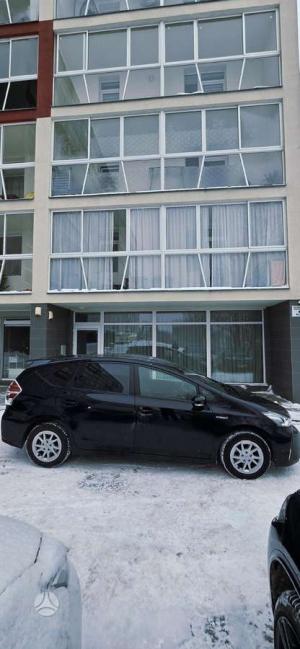 Black Toyota Prius 2016 in Vilnius, with an engine capacity of 1.80 L and mileage of 288 thousand km for 11400 €, photo 6 on AUTOMOTO.COM.LV