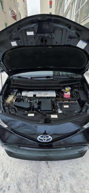 Black Toyota Prius 2016 in Vilnius, with an engine capacity of 1.80 L and mileage of 288 thousand km for 11400 €, photo 11 on AUTOMOTO.COM.LV