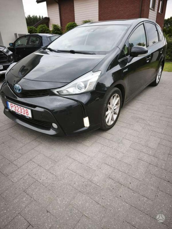 Black Toyota Prius 2020 in Kaunas, with an engine capacity of 1.80 L and mileage of 280 thousand km for 12500 €, photo 4 on AUTOMOTO.COM.LV