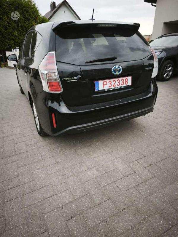 Black Toyota Prius 2020 in Kaunas, with an engine capacity of 1.80 L and mileage of 280 thousand km for 12500 €, photo 6 on AUTOMOTO.COM.LV