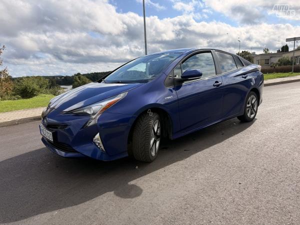 Blue Toyota Prius 2016 in Trakai, with an engine capacity of 1.80 L and mileage of 164 thousand km for 13400 €, photo 4 on AUTOMOTO.COM.LV