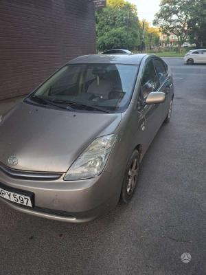 Brūns Toyota Prius 2006 Viļņa, ar dzinēja tilpumu 1.50 L un nobraukumu 250 tūkst. km par 2650 €, foto  vietnē AUTOMOTO.COM.LV