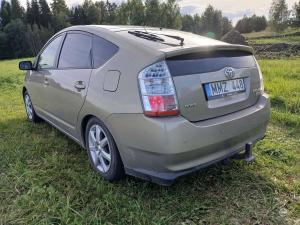 Brown Toyota Prius 2007 in Utena, with an engine capacity of 1.50 L and mileage of 300 thousand km for 5100 €, photo 12 on AUTOMOTO.COM.LV