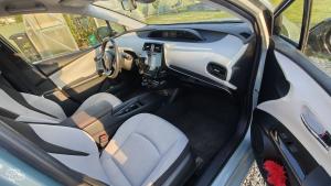 Green Toyota Prius 2019 in Jonava, with an engine capacity of 1.80 L and mileage of 105 thousand km for 13300 €, photo 10 on AUTOMOTO.COM.LV