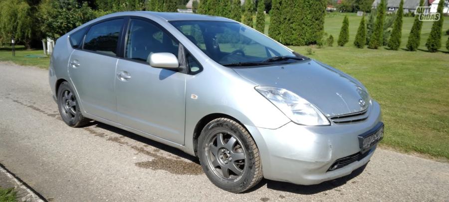 Pelēks Toyota Prius 2005 Elektrėnai, ar dzinēja tilpumu 1.50 L un nobraukumu 420 tūkst. km par 1350 €, foto 3 vietnē AUTOMOTO.COM.LV
