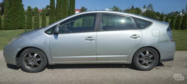 Pelēks Toyota Prius 2005 Elektrėnai, ar dzinēja tilpumu 1.50 L un nobraukumu 420 tūkst. km par 1350 €, foto 7 vietnē AUTOMOTO.COM.LV