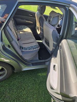 Pelēks Toyota Prius 2005 Prienai, ar dzinēja tilpumu 1.50 L un nobraukumu 299 tūkst. km par 3300 €, foto 8 vietnē AUTOMOTO.COM.LV