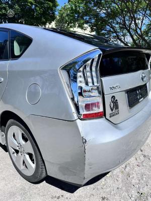 Grey Toyota Prius 2011 in Panevezys, with an engine capacity of 1.80 L and mileage of 230 thousand km for 5800 €, photo 13 on AUTOMOTO.COM.LV