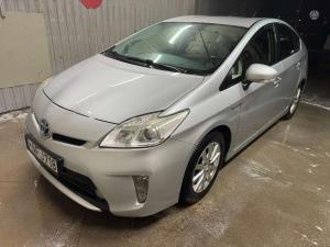 Grey Toyota Prius 2012 in Vilnius, with an engine capacity of 1.80 L and mileage of 300 thousand km for 6700 €, photo  on AUTOMOTO.COM.LV