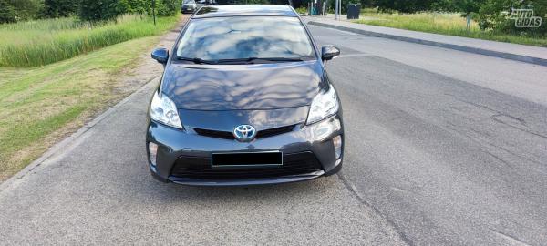 Grey Toyota Prius 2014 in Vilnius, with an engine capacity of 1.80 L and mileage of 125 thousand km for 8200 €, photo 1 on AUTOMOTO.COM.LV