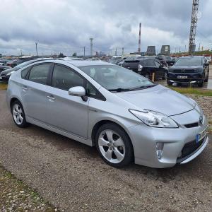 Grey Toyota Prius 2015 in Vilnius, with an engine capacity of 1.80 L and mileage of 280 thousand km for 7600 €, photo 4 on AUTOMOTO.COM.LV