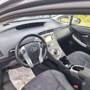 Grey Toyota Prius 2015 in Vilnius, with an engine capacity of 1.80 L and mileage of 240 thousand km for 7600 €, photo 14 on AUTOMOTO.COM.LV