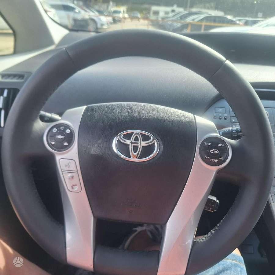 Pelēks Toyota Prius 2015 Viļņa, ar dzinēja tilpumu 1.80 L un nobraukumu 280 tūkst. km par 7600 €, foto 11 vietnē AUTOMOTO.COM.LV