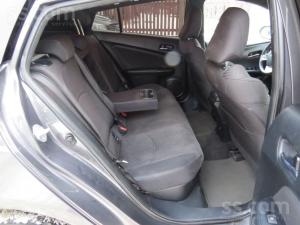 Grey Toyota Prius 2016 in Riga, with an engine capacity of 1.80 L and mileage of 223 thousand km for 11290 €, photo 10 on AUTOMOTO.COM.LV