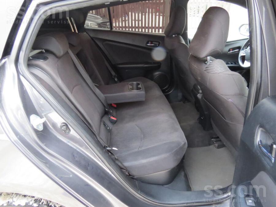 Grey Toyota Prius 2016 in Riga, with an engine capacity of 1.80 L and mileage of 223 thousand km for 11290 €, photo 10 on AUTOMOTO.COM.LV