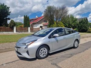 Grey Toyota Prius 2016 in Vilnius, with an engine capacity of 1.80 L and mileage of 147 thousand km for 9600 €, photo 5 on AUTOMOTO.COM.LV